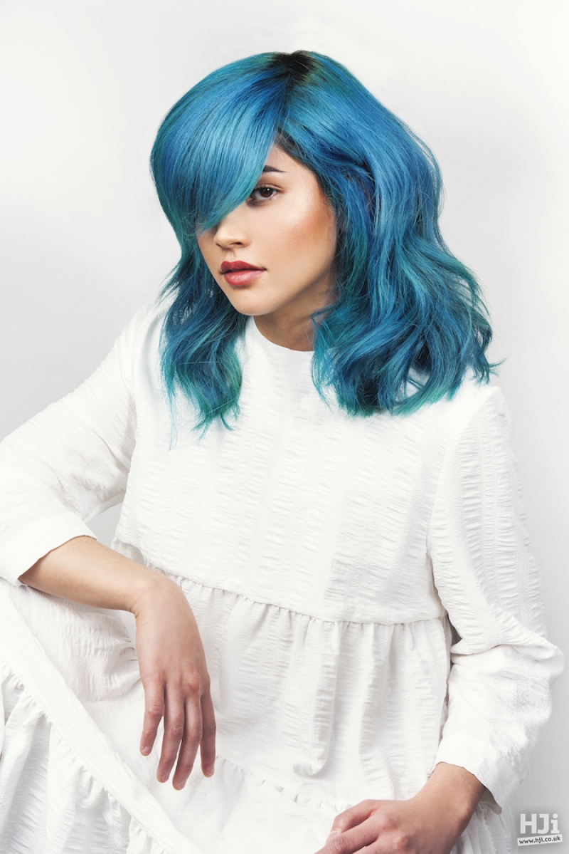 Bright blue style with deep side parting