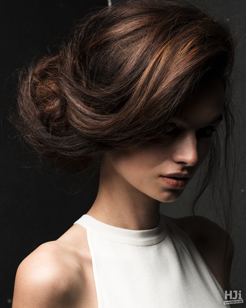 Brunette Updo With Sweeping Fringe