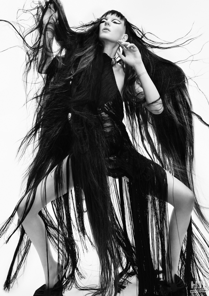 Exaggerated long hair, avant garde style