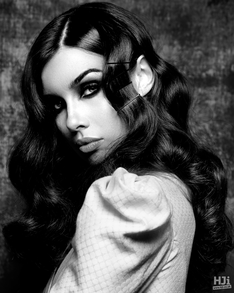 Sleek wavy black hair