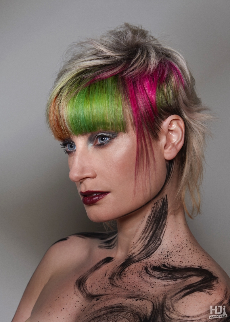 Short hair with creative colour peekaboo panels and split colour fringe