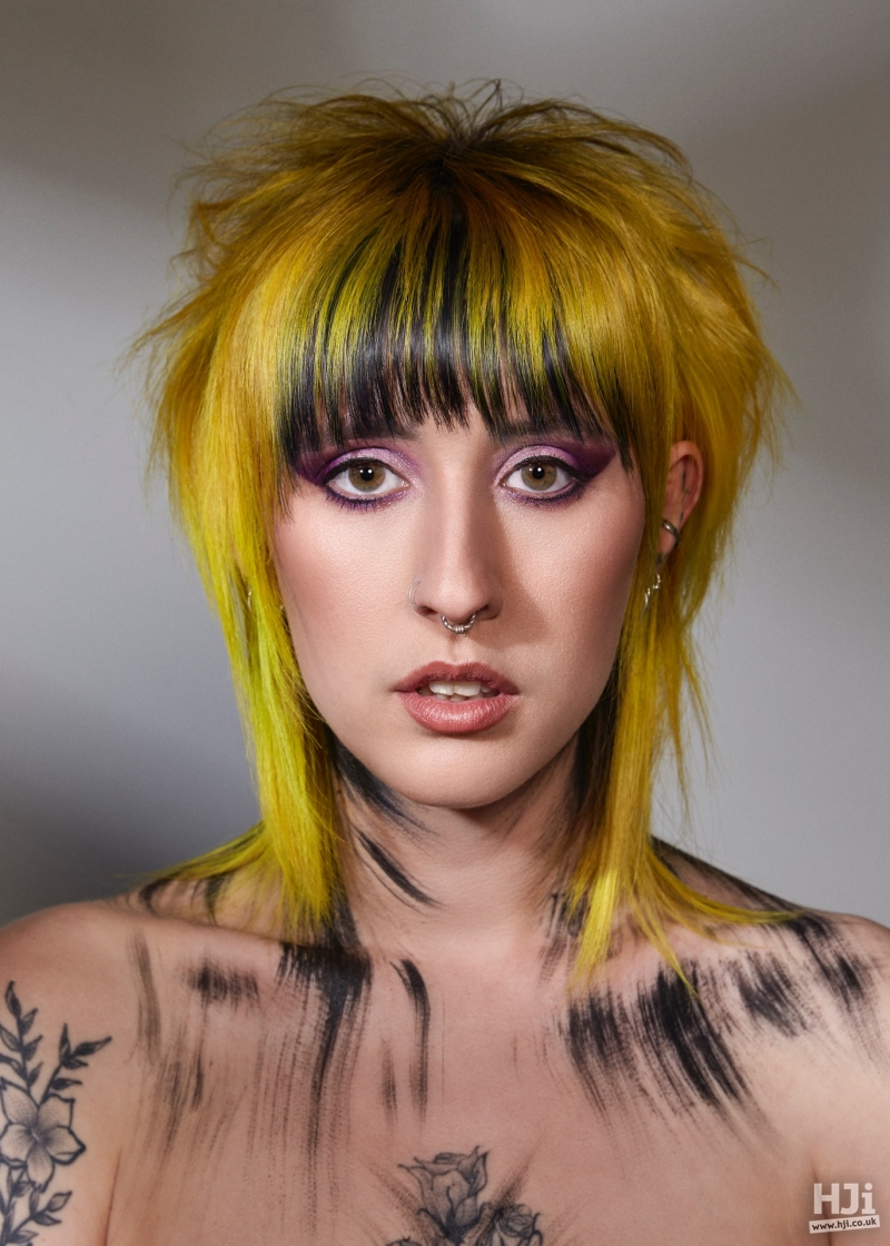 Yellow hair with black peekaboo panel fringe