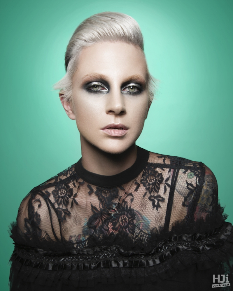 Sleek platinum crop with swept back fringe