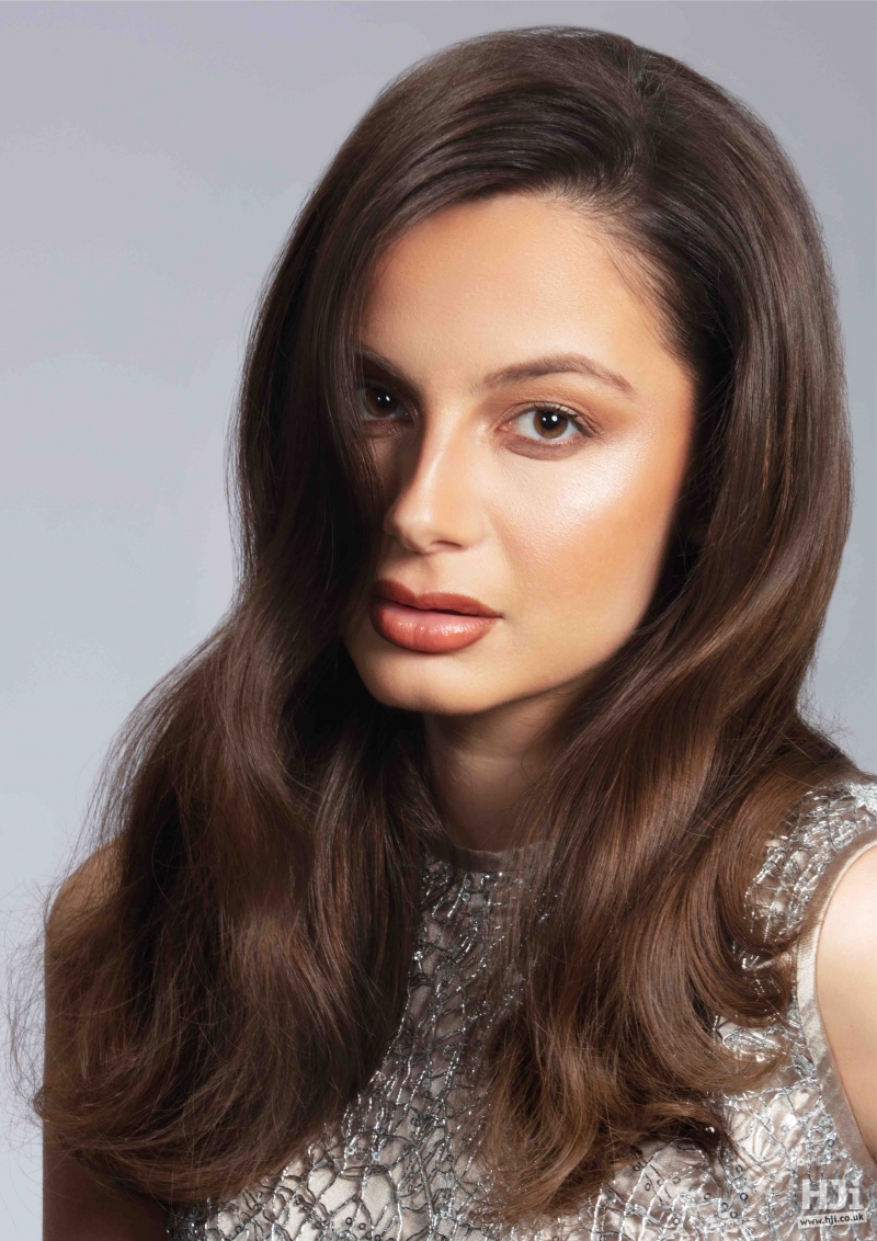 Sleek hair with subtle waves